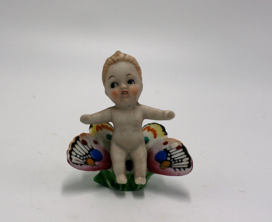 vintage bisque kewpie riding a butterfly made in occupied japan | Susan ...