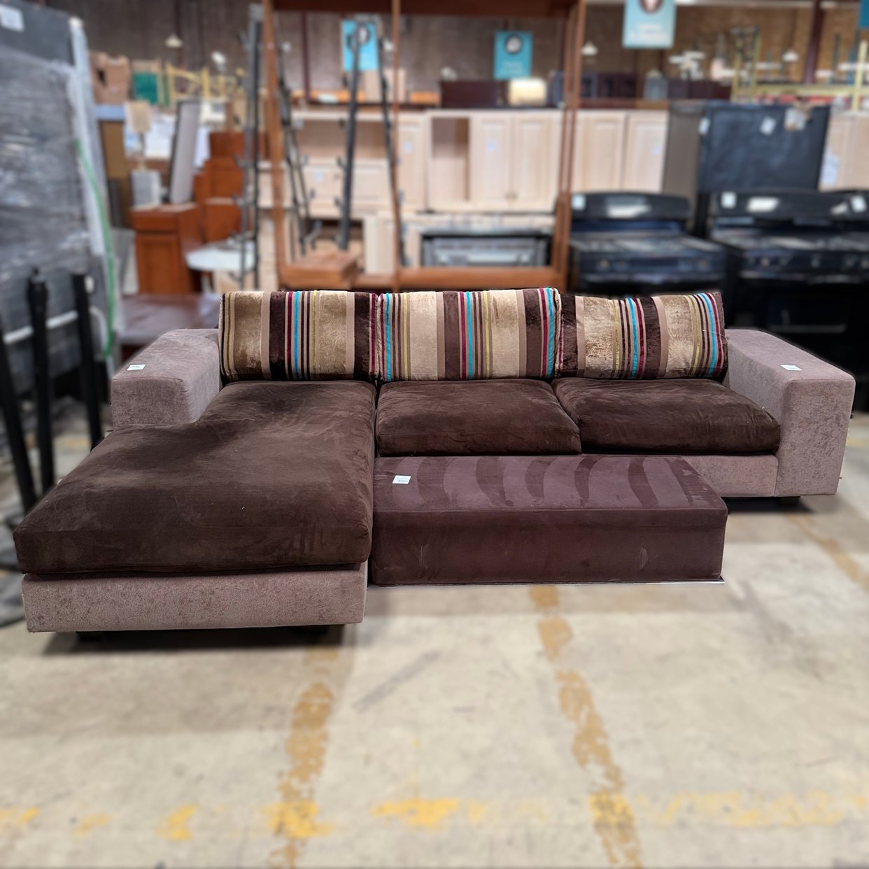 Steven Anthony Two-Tone Sectional Sofa with Striped Cushions ...