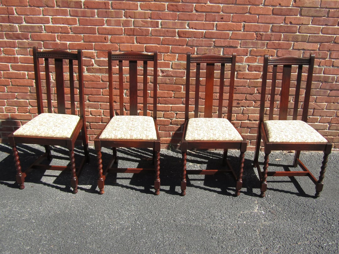A Classic set of four English solid-oak dining chairs, with | Larkin's ...